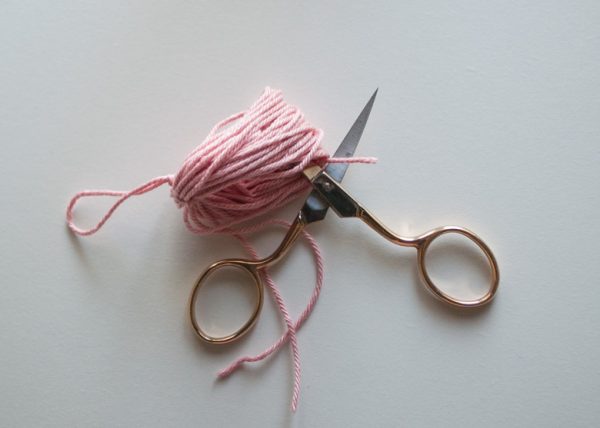 Quasten aus Wollresten selber machen